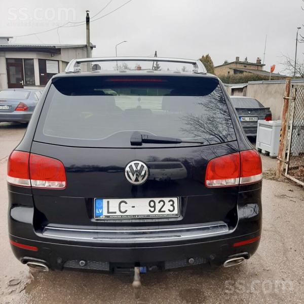 Melns Volkswagen Touareg 2006 Jelgava, ar dzinēja tilpumu 3.00 L un nobraukumu 250 tūkst. km par 9500 €, foto 4 vietnē AUTOMOTO.COM.LV