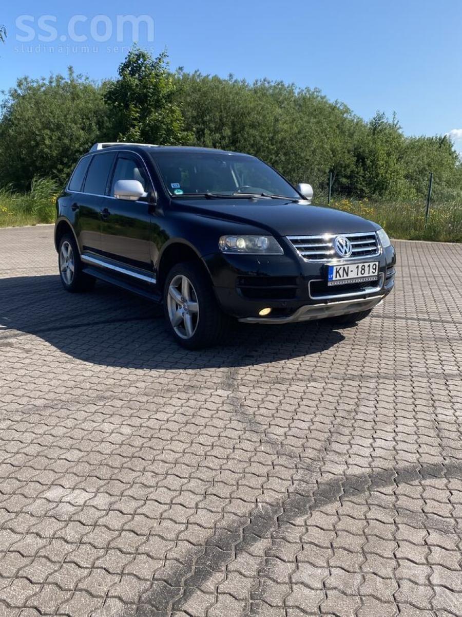 Black Volkswagen Touareg 2006 in Ventspils, with an engine capacity of 3.00 L and mileage of 351 thousand km for 4850 €, photo 13 on AUTOMOTO.COM.LV