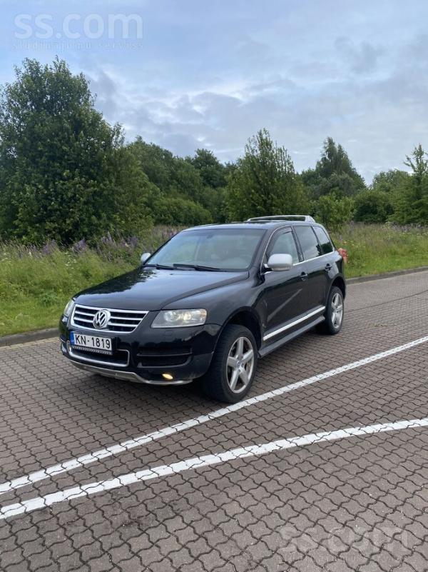 Melns Volkswagen Touareg 2006 Ventspils, ar dzinēja tilpumu 3.00 L un nobraukumu 351 tūkst. km par 4350 €, foto 1 vietnē AUTOMOTO.COM.LV