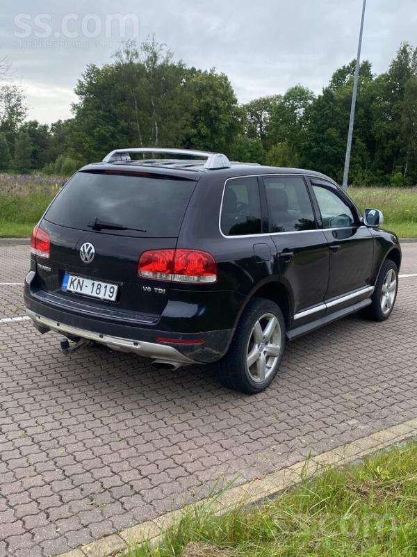 Melns Volkswagen Touareg 2006 Ventspils, ar dzinēja tilpumu 3.00 L un nobraukumu 351 tūkst. km par 4350 €, foto 4 vietnē AUTOMOTO.COM.LV
