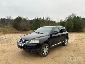 Black Volkswagen Touareg 2006 in Riga, with an engine capacity of 3.00 L and mileage of 282 thousand km for 3500 €, photo  on AUTOMOTO.COM.LV