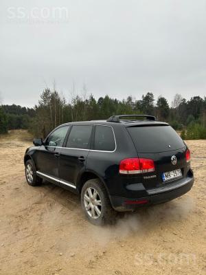 Black Volkswagen Touareg 2006 in Riga, with an engine capacity of 3.00 L and mileage of 282 thousand km for 3500 €, photo 4 on AUTOMOTO.COM.LV