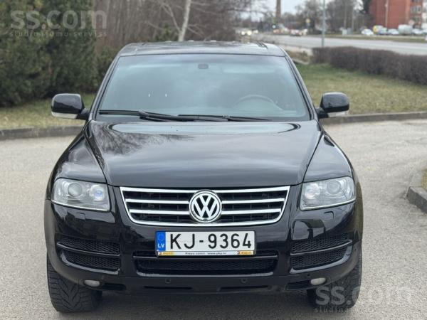 Black Volkswagen Touareg 2006 in Jelgava, with an engine capacity of 3.00 L and mileage of 372 thousand km for 3100 €, photo 2 on AUTOMOTO.COM.LV