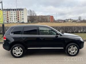 Melns Volkswagen Touareg 2006 Jelgava, ar dzinēja tilpumu 3.00 L un nobraukumu 372 tūkst. km par 3100 €, foto 4 vietnē AUTOMOTO.COM.LV
