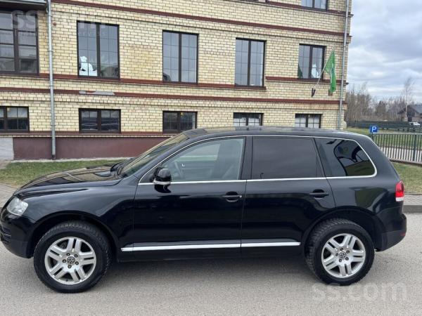 Black Volkswagen Touareg 2006 in Jelgava, with an engine capacity of 3.00 L and mileage of 372 thousand km for 3100 €, photo 5 on AUTOMOTO.COM.LV