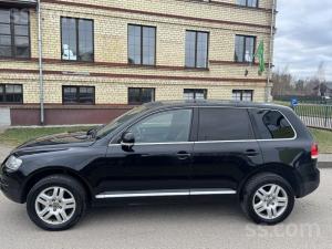 Melns Volkswagen Touareg 2006 Jelgava, ar dzinēja tilpumu 3.00 L un nobraukumu 372 tūkst. km par 3100 €, foto 5 vietnē AUTOMOTO.COM.LV