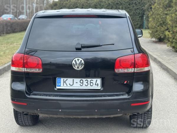 Black Volkswagen Touareg 2006 in Jelgava, with an engine capacity of 3.00 L and mileage of 372 thousand km for 3100 €, photo 7 on AUTOMOTO.COM.LV