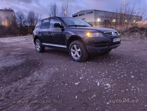 Black Volkswagen Touareg 2006 in Tallinn, with an engine capacity of 2.50 L and mileage of 417 thousand km for 2290 €, photo 2 on AUTOMOTO.COM.LV