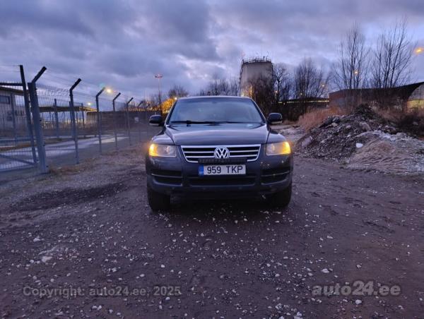 Melns Volkswagen Touareg 2006 Tallina, ar dzinēja tilpumu 2.50 L un nobraukumu 417 tūkst. km par 2290 €, foto 3 vietnē AUTOMOTO.COM.LV