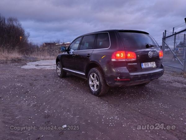 Melns Volkswagen Touareg 2006 Tallina, ar dzinēja tilpumu 2.50 L un nobraukumu 417 tūkst. km par 2290 €, foto 6 vietnē AUTOMOTO.COM.LV