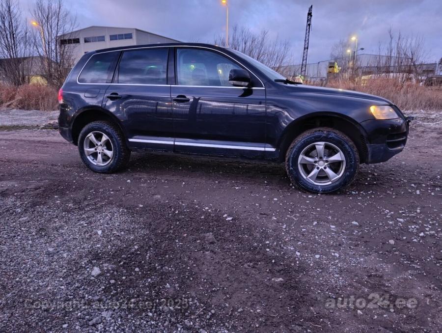 Black Volkswagen Touareg 2006 in Tallinn, with an engine capacity of 2.50 L and mileage of 417 thousand km for 2290 €, photo 7 on AUTOMOTO.COM.LV