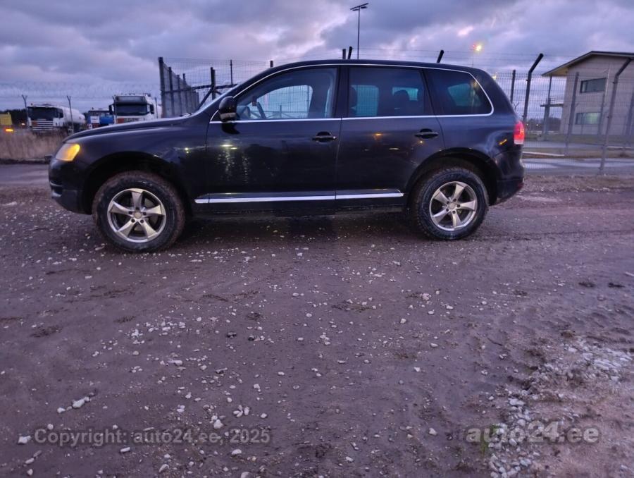 Black Volkswagen Touareg 2006 in Tallinn, with an engine capacity of 2.50 L and mileage of 417 thousand km for 2290 €, photo 8 on AUTOMOTO.COM.LV