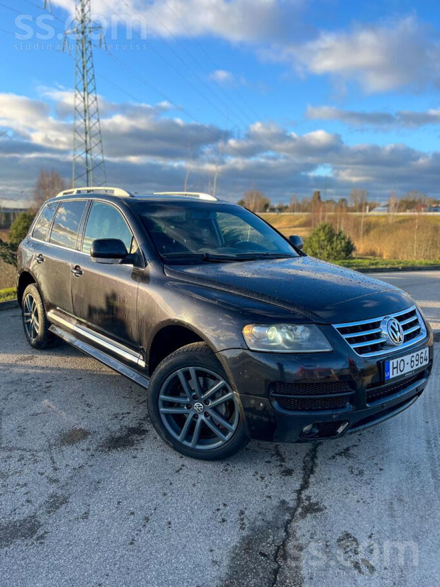Melns Volkswagen Touareg 2006 Ogre, ar dzinēja tilpumu 3.00 L un nobraukumu 336 tūkst. km par 4150 €, foto 1 vietnē AUTOMOTO.COM.LV