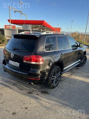 Melns Volkswagen Touareg 2006 Ogre, ar dzinēja tilpumu 3.00 L un nobraukumu 336 tūkst. km par 4150 €, foto 4 vietnē AUTOMOTO.COM.LV