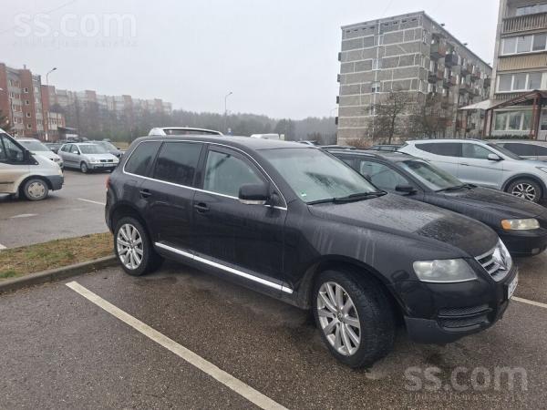 Black Volkswagen Touareg 2006 in Daugavpils, with an engine capacity of 3.00 L and mileage of 248 thousand km for 6250 €, photo 2 on AUTOMOTO.COM.LV