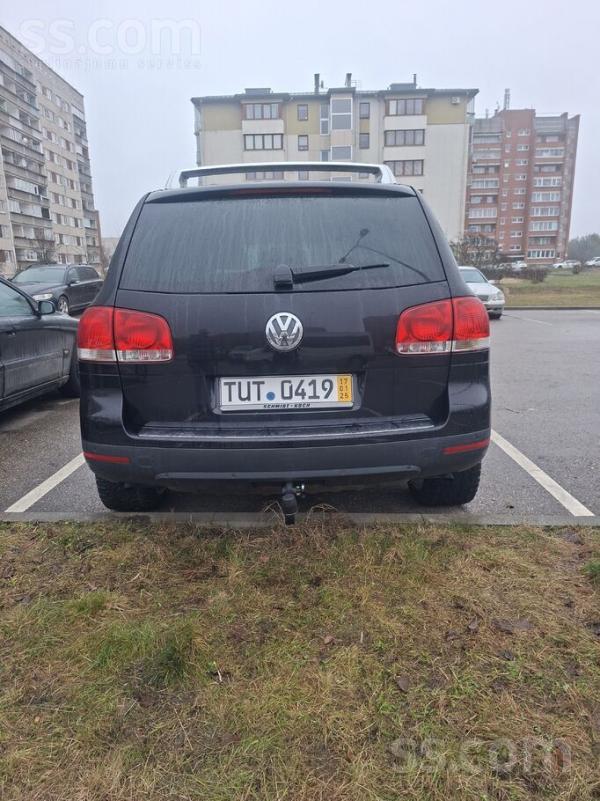 Black Volkswagen Touareg 2006 in Daugavpils, with an engine capacity of 3.00 L and mileage of 248 thousand km for 6250 €, photo 5 on AUTOMOTO.COM.LV