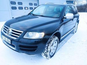 Black Volkswagen Touareg 2006 in Utena, with an engine capacity of 2.97 L and mileage of 245 thousand km for 5400 €, photo 5 on AUTOMOTO.COM.LV