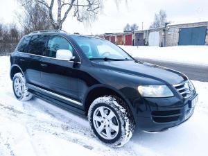 Black Volkswagen Touareg 2006 in Utena, with an engine capacity of 2.97 L and mileage of 245 thousand km for 5400 €, photo 11 on AUTOMOTO.COM.LV