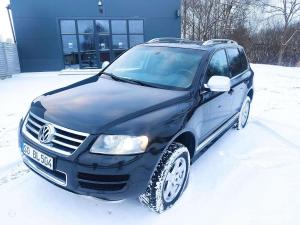 Black Volkswagen Touareg 2006 in Utena, with an engine capacity of 2.97 L and mileage of 245 thousand km for 5400 €, photo 12 on AUTOMOTO.COM.LV
