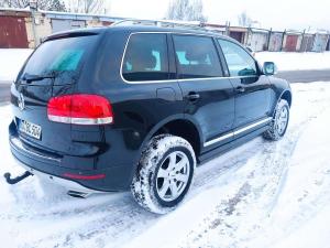 Black Volkswagen Touareg 2006 in Utena, with an engine capacity of 2.97 L and mileage of 245 thousand km for 5400 €, photo 15 on AUTOMOTO.COM.LV