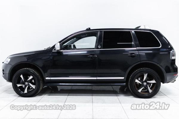Black Volkswagen Touareg 2006 in Tallinn, with an engine capacity of 3.00 L and mileage of 451 thousand km for 3999 €, photo 4 on AUTOMOTO.COM.LV