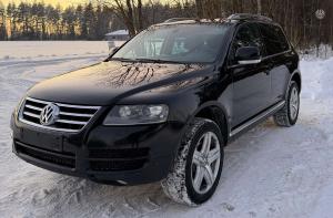 Black Volkswagen Touareg 2006 in Vilnius, with an engine capacity of 2.97 L and mileage of 355 thousand km for 3950 €, photo 8 on AUTOMOTO.COM.LV