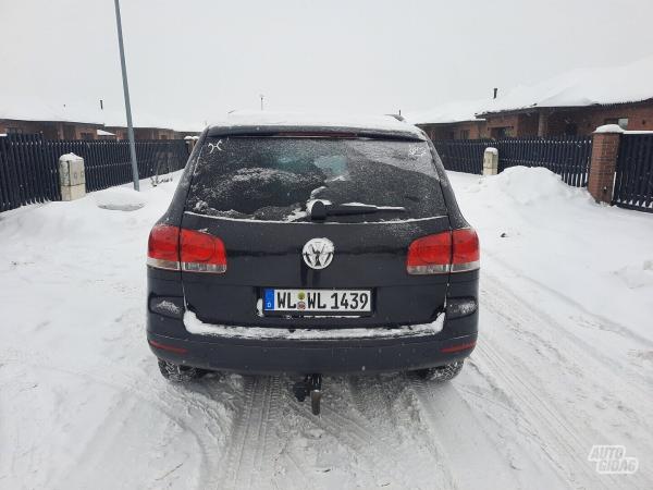 Melns Volkswagen Touareg 2006 Klaipėda, ar dzinēja tilpumu 3.00 L un nobraukumu 261 tūkst. km par 4590 €, foto 5 vietnē AUTOMOTO.COM.LV