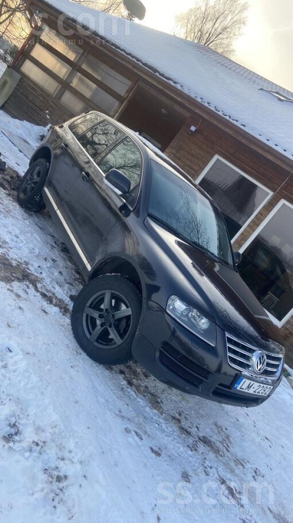 Melns Volkswagen Touareg 2006 Limbaži, ar dzinēja tilpumu 3.00 L un nobraukumu 325 tūkst. km par 3600 €, foto 1 vietnē AUTOMOTO.COM.LV