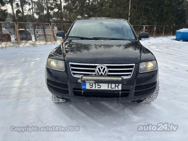 Melns Volkswagen Touareg 2006 Tallina, ar dzinēja tilpumu 3.00 L un nobraukumu 460 tūkst. km par 5500 €, foto 1 vietnē AUTOMOTO.COM.LV