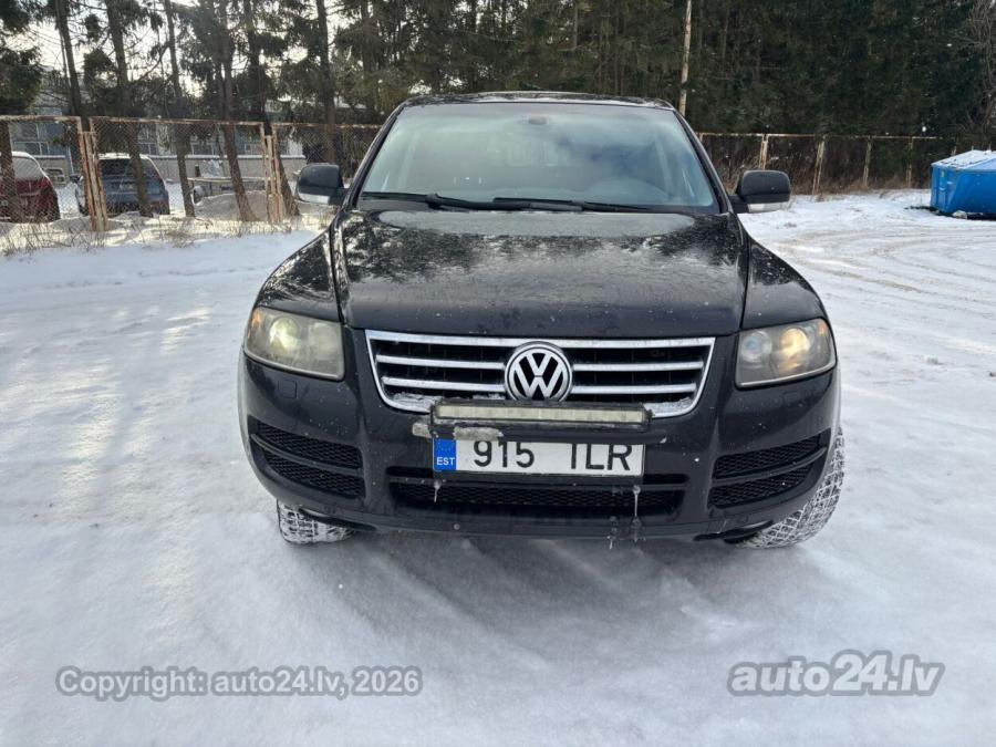 Black Volkswagen Touareg 2006 in Tallinn, with an engine capacity of 3.00 L and mileage of 460 thousand km for 5500 €, photo 1 on AUTOMOTO.COM.LV