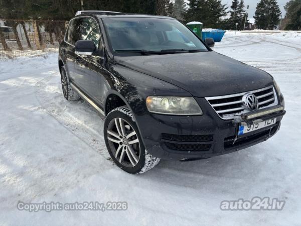 Melns Volkswagen Touareg 2006 Tallina, ar dzinēja tilpumu 3.00 L un nobraukumu 460 tūkst. km par 5500 €, foto 4 vietnē AUTOMOTO.COM.LV