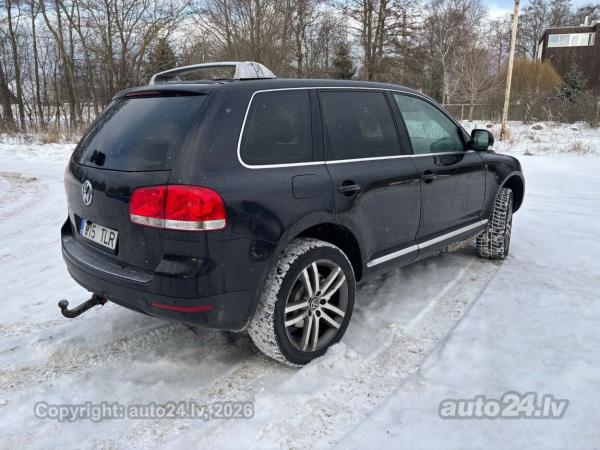 Melns Volkswagen Touareg 2006 Tallina, ar dzinēja tilpumu 3.00 L un nobraukumu 460 tūkst. km par 5500 €, foto 6 vietnē AUTOMOTO.COM.LV