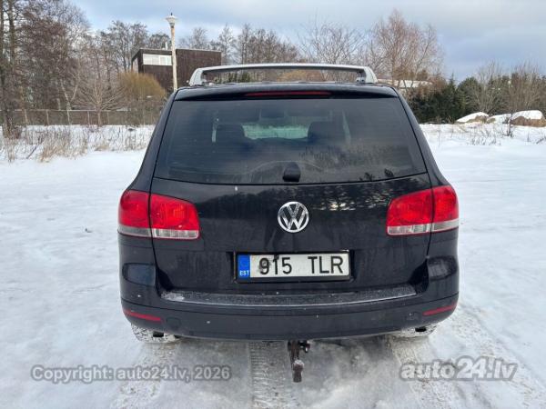 Melns Volkswagen Touareg 2006 Tallina, ar dzinēja tilpumu 3.00 L un nobraukumu 460 tūkst. km par 5500 €, foto 7 vietnē AUTOMOTO.COM.LV