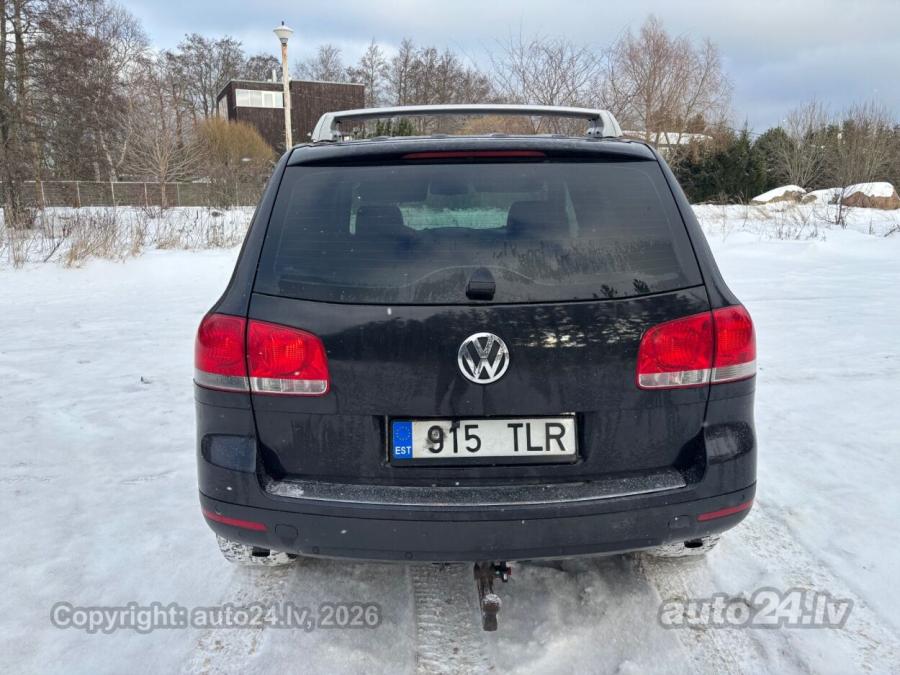 Black Volkswagen Touareg 2006 in Tallinn, with an engine capacity of 3.00 L and mileage of 460 thousand km for 5500 €, photo 7 on AUTOMOTO.COM.LV