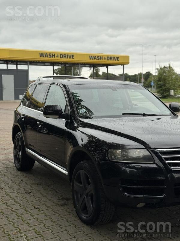 Melns Volkswagen Touareg 2006 Ventspils, ar dzinēja tilpumu 2.50 L un nobraukumu 343 tūkst. km par 4200 €, foto 2 vietnē AUTOMOTO.COM.LV