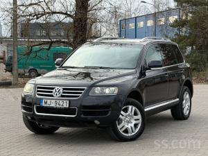 Black Volkswagen Touareg 2006 in Riga, with an engine capacity of 3.00 L and mileage of 0 thousand km for 4890 €, photo  on AUTOMOTO.COM.LV