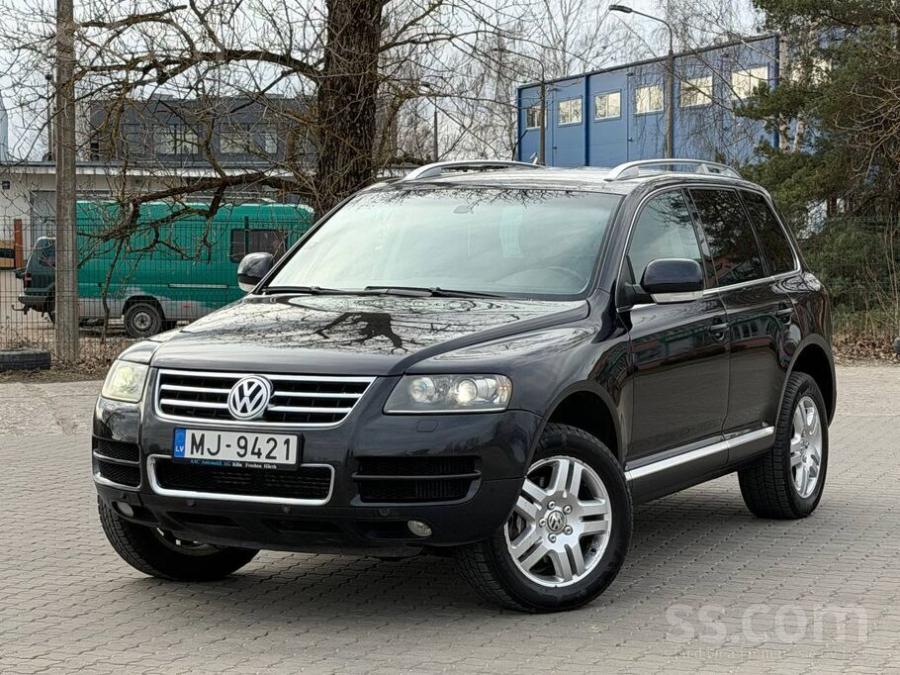 Melns Volkswagen Touareg 2006 Rīga, ar dzinēja tilpumu 3.00 L un nobraukumu 0 tūkst. km par 4890 €, foto 1 vietnē AUTOMOTO.COM.LV