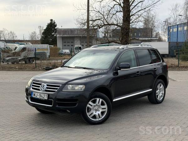 Melns Volkswagen Touareg 2006 Rīga, ar dzinēja tilpumu 3.00 L un nobraukumu 0 tūkst. km par 4890 €, foto 5 vietnē AUTOMOTO.COM.LV
