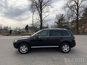 Melns Volkswagen Touareg 2006 Rīga, ar dzinēja tilpumu 3.00 L un nobraukumu 0 tūkst. km par 4890 €, foto 11 vietnē AUTOMOTO.COM.LV