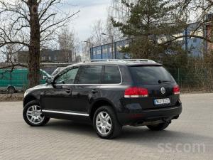 Melns Volkswagen Touareg 2006 Rīga, ar dzinēja tilpumu 3.00 L un nobraukumu 0 tūkst. km par 4890 €, foto 12 vietnē AUTOMOTO.COM.LV