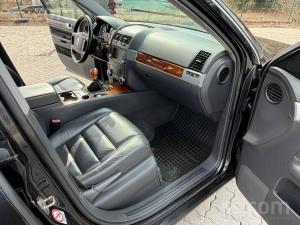 Melns Volkswagen Touareg 2006 Rīga, ar dzinēja tilpumu 3.00 L un nobraukumu 0 tūkst. km par 4890 €, foto 22 vietnē AUTOMOTO.COM.LV