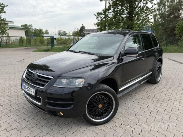 Black Volkswagen Touareg 2006 in Riga, with an engine capacity of 5.00 L and mileage of 0 thousand km for 7999 €, photo 7 on AUTOMOTO.COM.LV