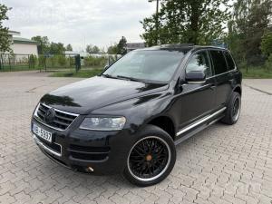 Black Volkswagen Touareg 2006 in Riga, with an engine capacity of 5.00 L and mileage of 0 thousand km for 7999 €, photo 8 on AUTOMOTO.COM.LV