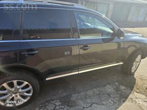 Melns Volkswagen Touareg 2006 Rīga, ar dzinēja tilpumu 3.00 L un nobraukumu 302 tūkst. km par 4390 €, foto 3 vietnē AUTOMOTO.COM.LV