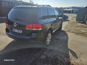 Melns Volkswagen Touareg 2006 Rīga, ar dzinēja tilpumu 3.00 L un nobraukumu 302 tūkst. km par 4390 €, foto 4 vietnē AUTOMOTO.COM.LV
