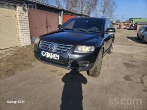 Melns Volkswagen Touareg 2006 Rīga, ar dzinēja tilpumu 3.00 L un nobraukumu 302 tūkst. km par 4390 €, foto 7 vietnē AUTOMOTO.COM.LV