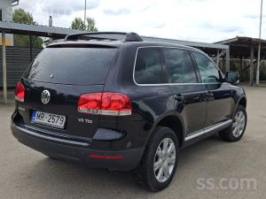 Melns Volkswagen Touareg 2006 Rīga, ar dzinēja tilpumu 3.00 L un nobraukumu 282 tūkst. km par 3500 €, foto 3 vietnē AUTOMOTO.COM.LV