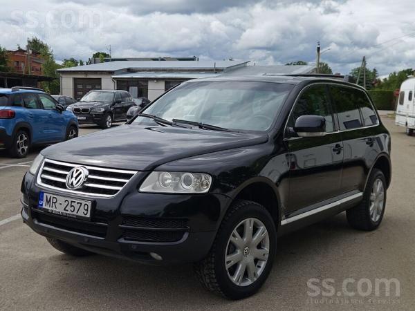 Black Volkswagen Touareg 2006 in Riga, with an engine capacity of 3.00 L and mileage of 282 thousand km for 3500 €, photo 3 on AUTOMOTO.COM.LV