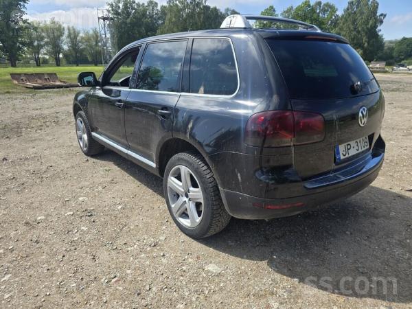 Melns Volkswagen Touareg 2006 Ventspils, ar dzinēja tilpumu 2.50 L un nobraukumu 340 tūkst. km par 2500 €, foto 3 vietnē AUTOMOTO.COM.LV