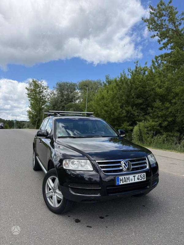 Melns Volkswagen Touareg 2006 Viļņa, ar dzinēja tilpumu 2.97 L un nobraukumu 270 tūkst. km par 4950 €, foto 1 vietnē AUTOMOTO.COM.LV